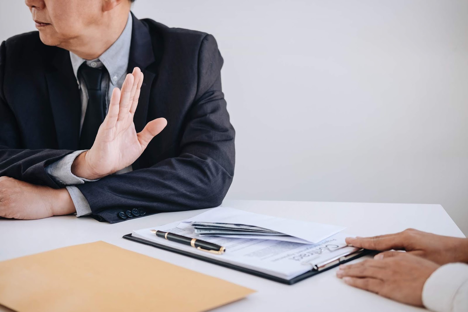 The Difference Between Bribery and Corruption