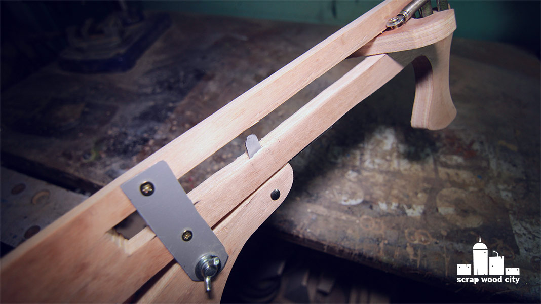 scrap wood city: DIY spring powered zombie apocalypse toy rifle