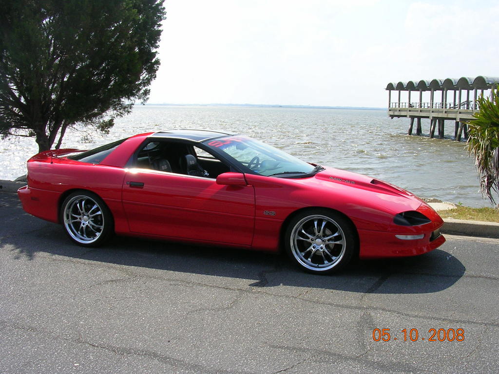 The World's Best 4th Gen Camaros: 97 Red Camaro SS LT1 on 20s