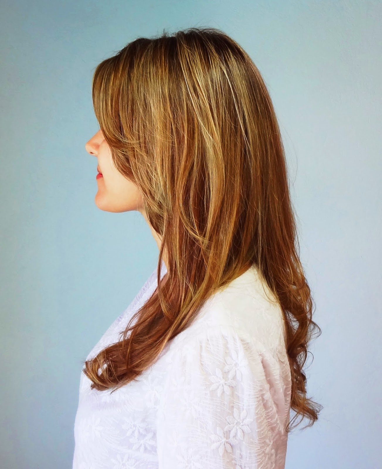 Luis Garcia e equipe.: Corte em camadas e com franja na diagonal.