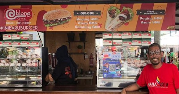 ajilpost: OBLONG BURGER SETANDING MC DONALD'S