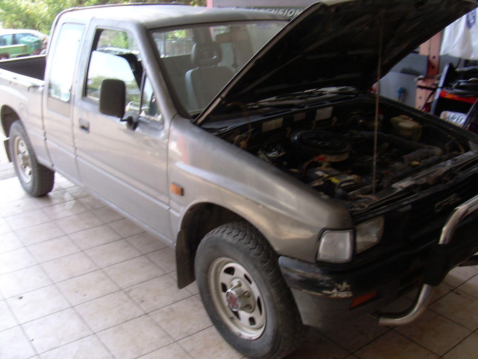 rompogiannakis gas: ISUZU -OPEL CAMPO 2300cc