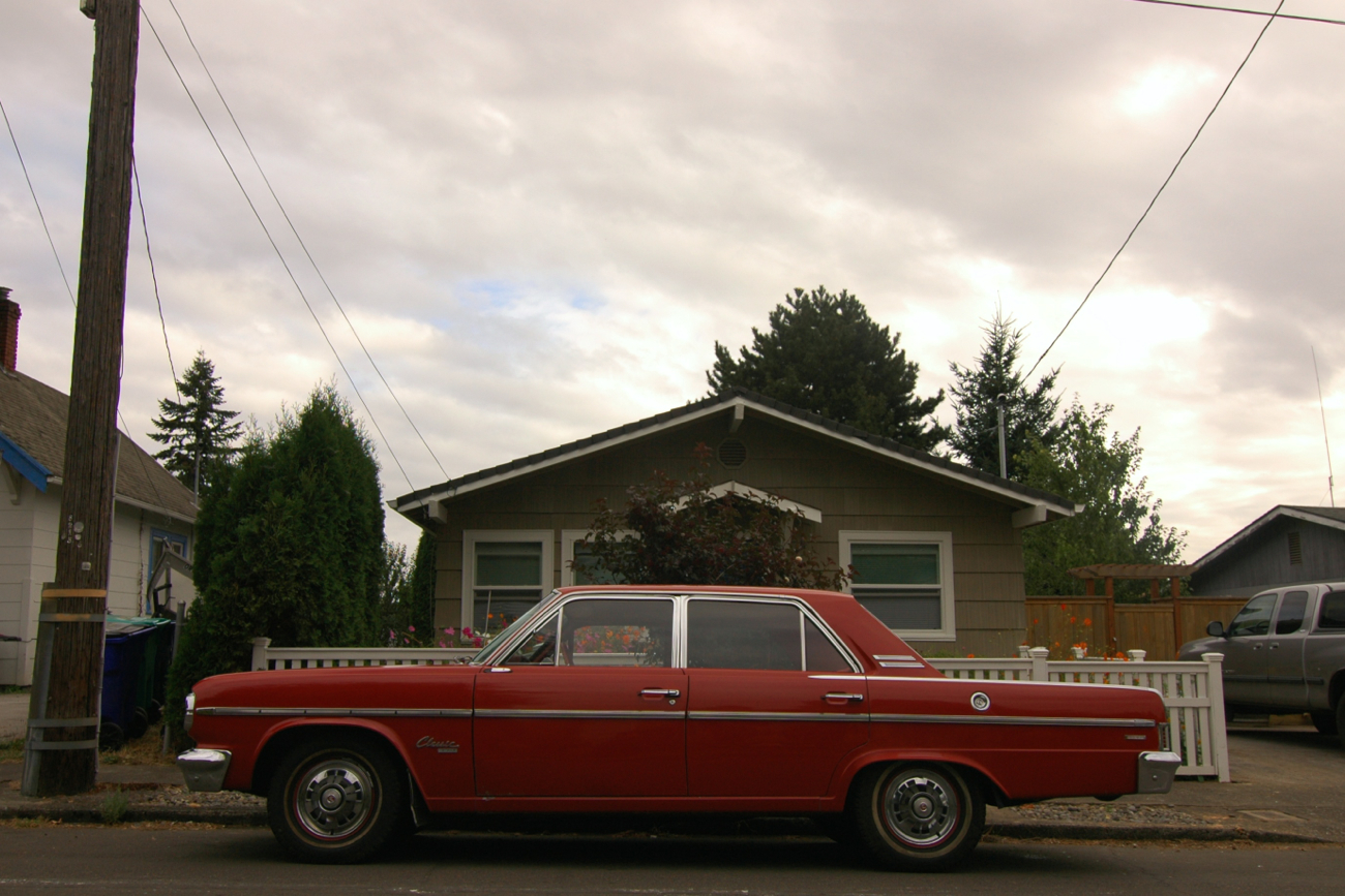 OLD PARKED CARS.: 1966 Rambler Classic 770.