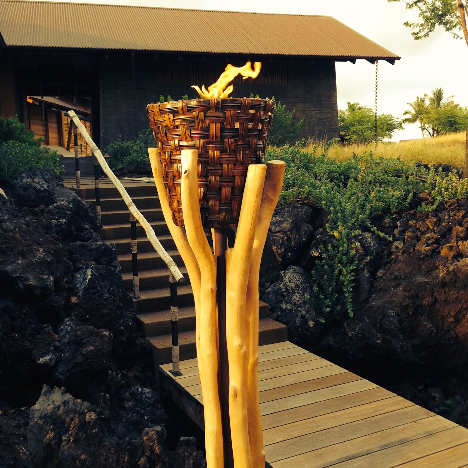 SCOTT NORWOOD FITZEL: Big Island woven copper tiki torches on ohia posts