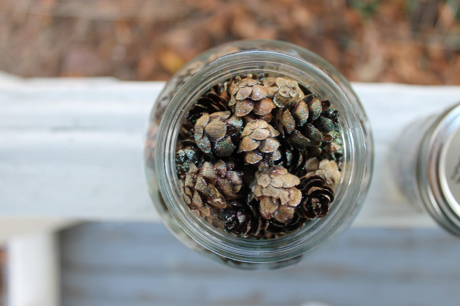 The Feisty Redhead: Quick DIY Glitter Pine Cone Mason Jar Centerpieces