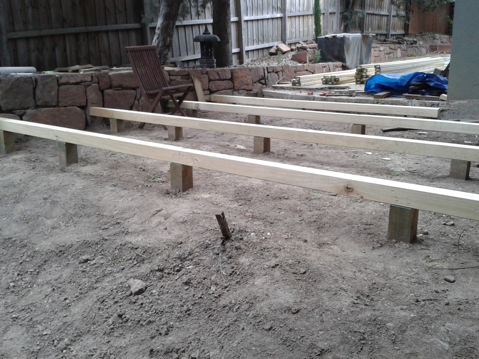 Let's Build a Deck: Time to build a deck. Laying down the bearers