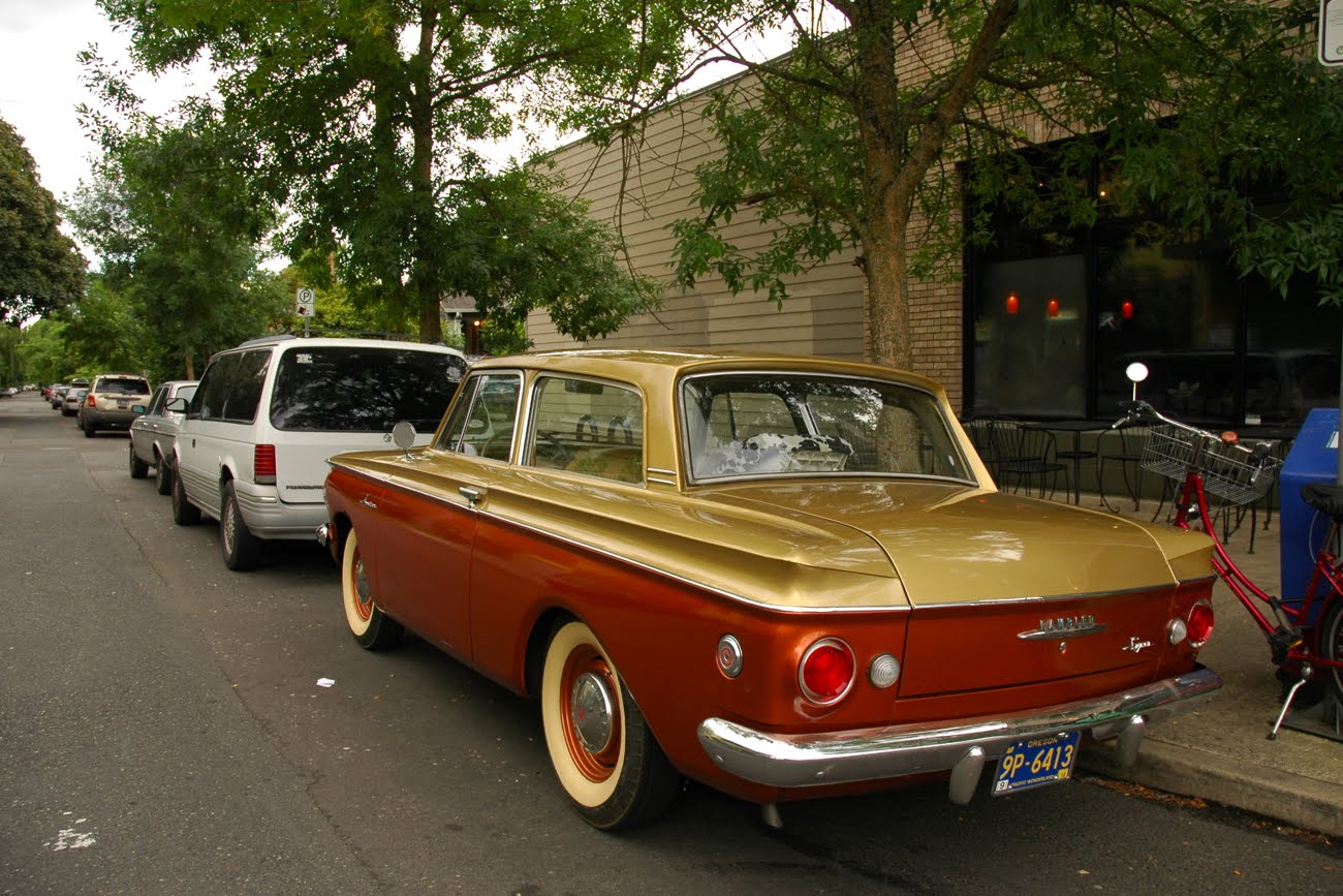 OLD PARKED CARS.: 1963 Rambler Super American.
