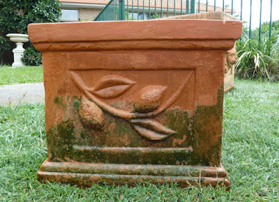 Stylish Settings: A Herb Garden and Liquid Sandstone