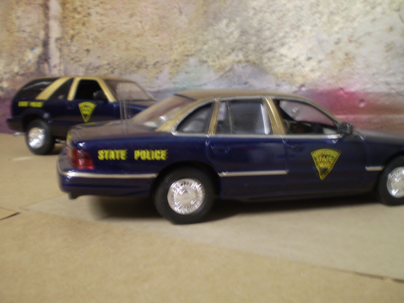 Barry Thomas’ “Wheel to Wheel”: Oct 9: Model Police Cars and a Cat