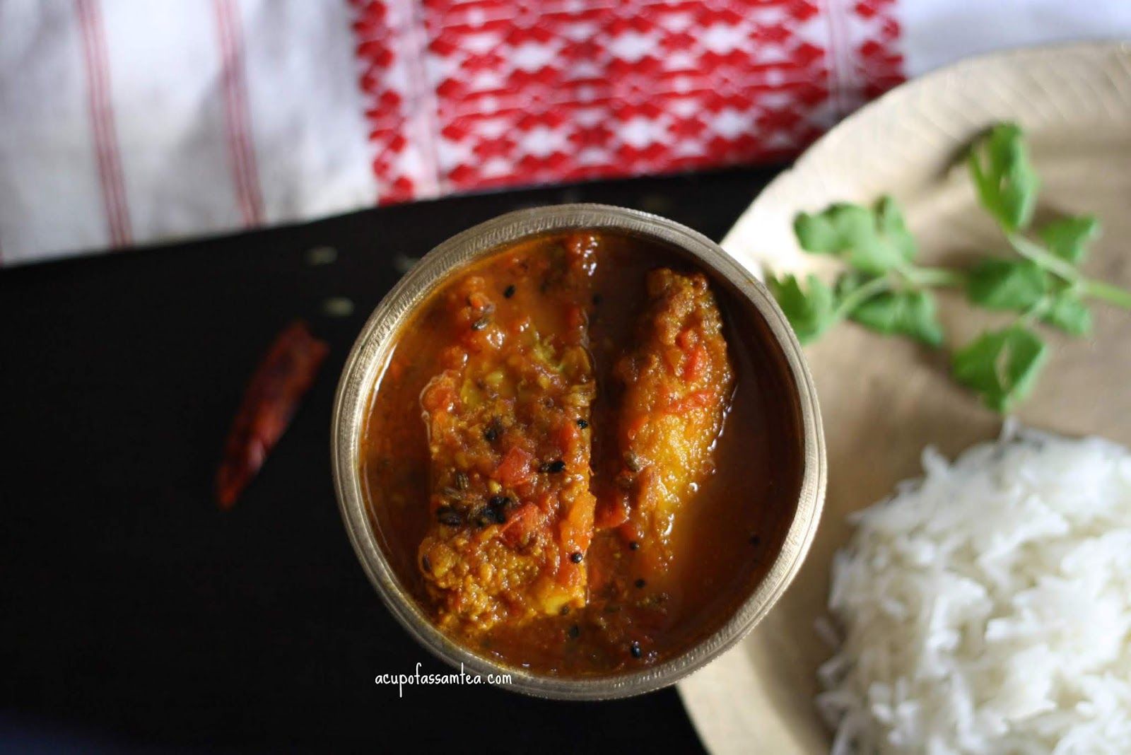 Masor tenga or Assamese style sour fish curry