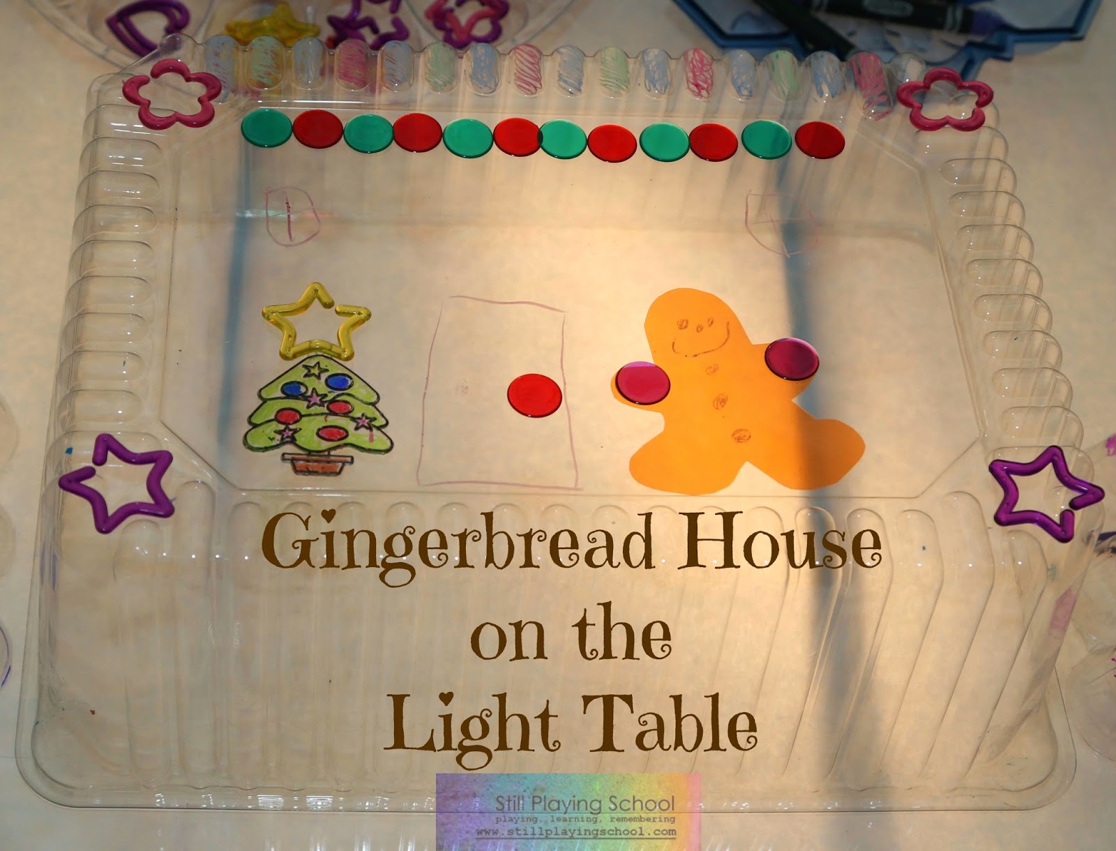 Gingerbread House on the Light Table | Still Playing School