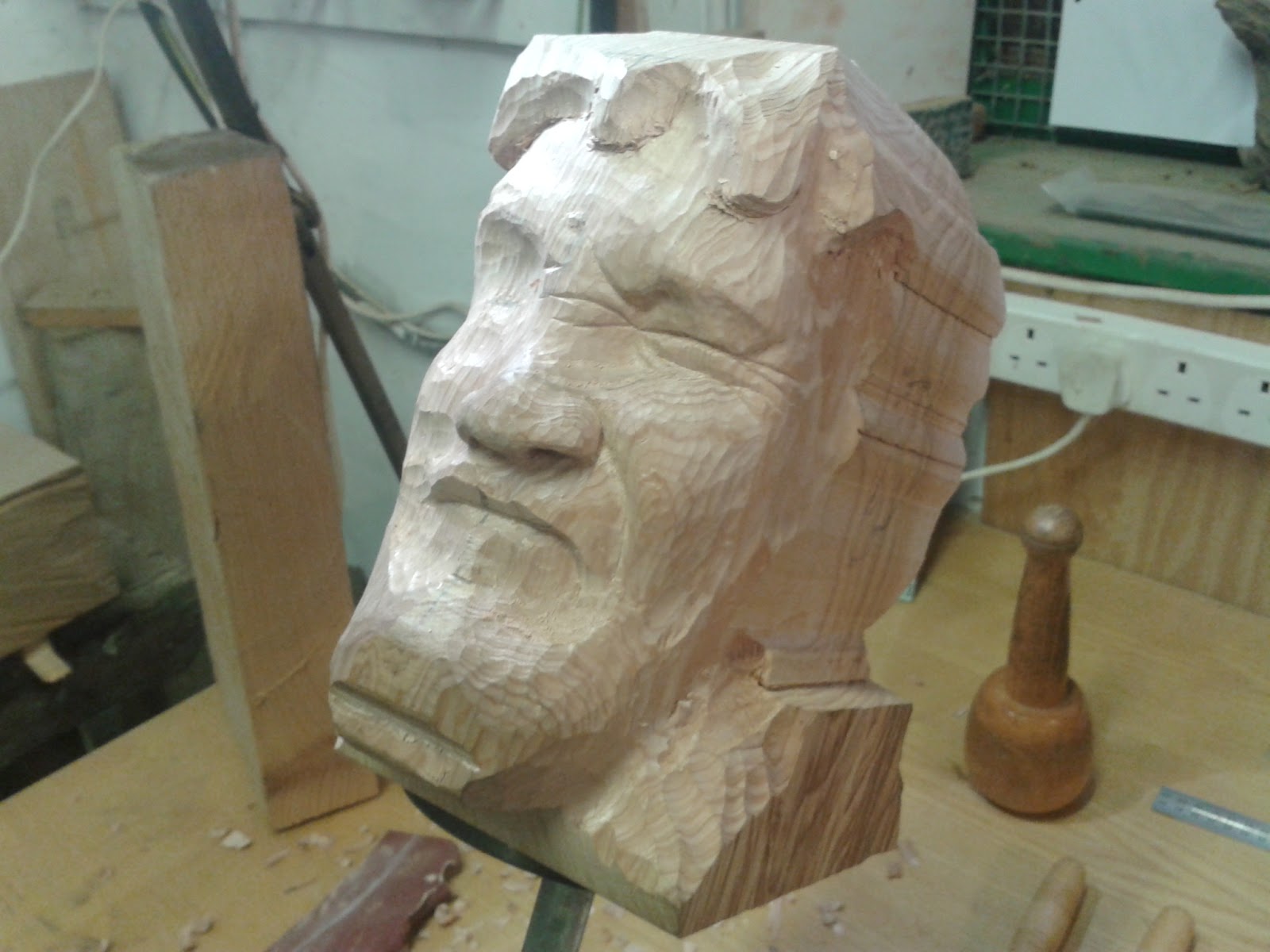 Carving a self portrait in wood for 'Cornucopia' at the Grant bradley ...