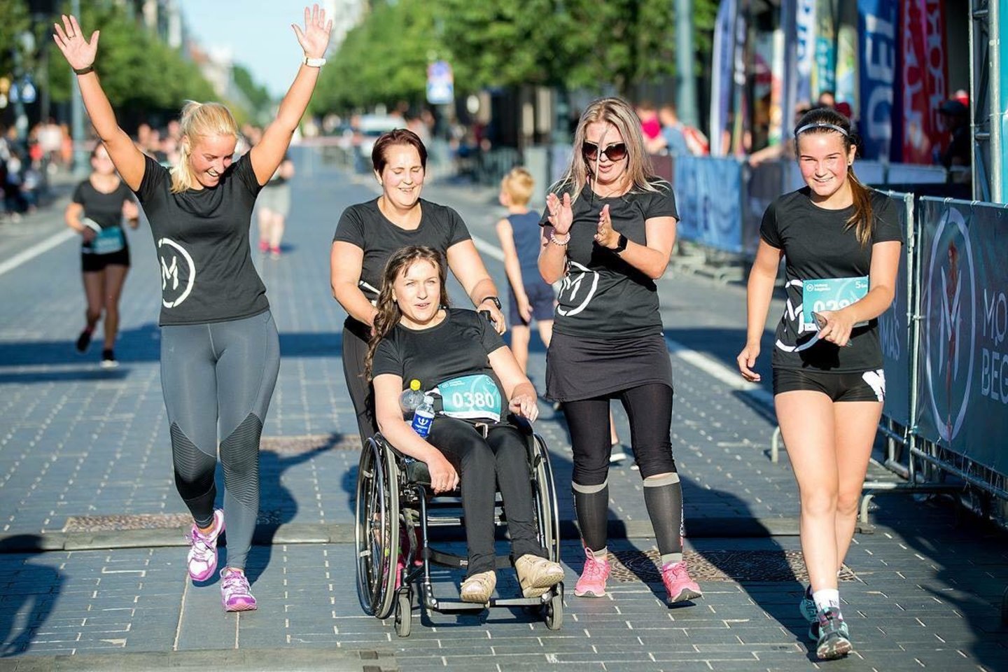 A wheelchair user in the women's run