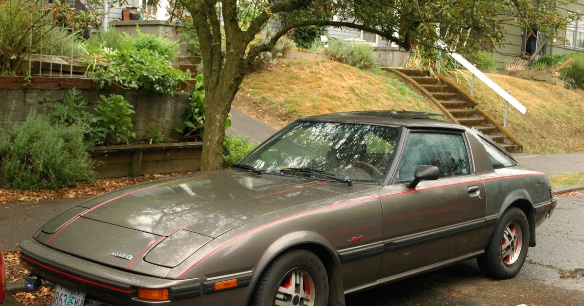 OLD PARKED CARS.: 1985 Mazda RX-7 GSL.