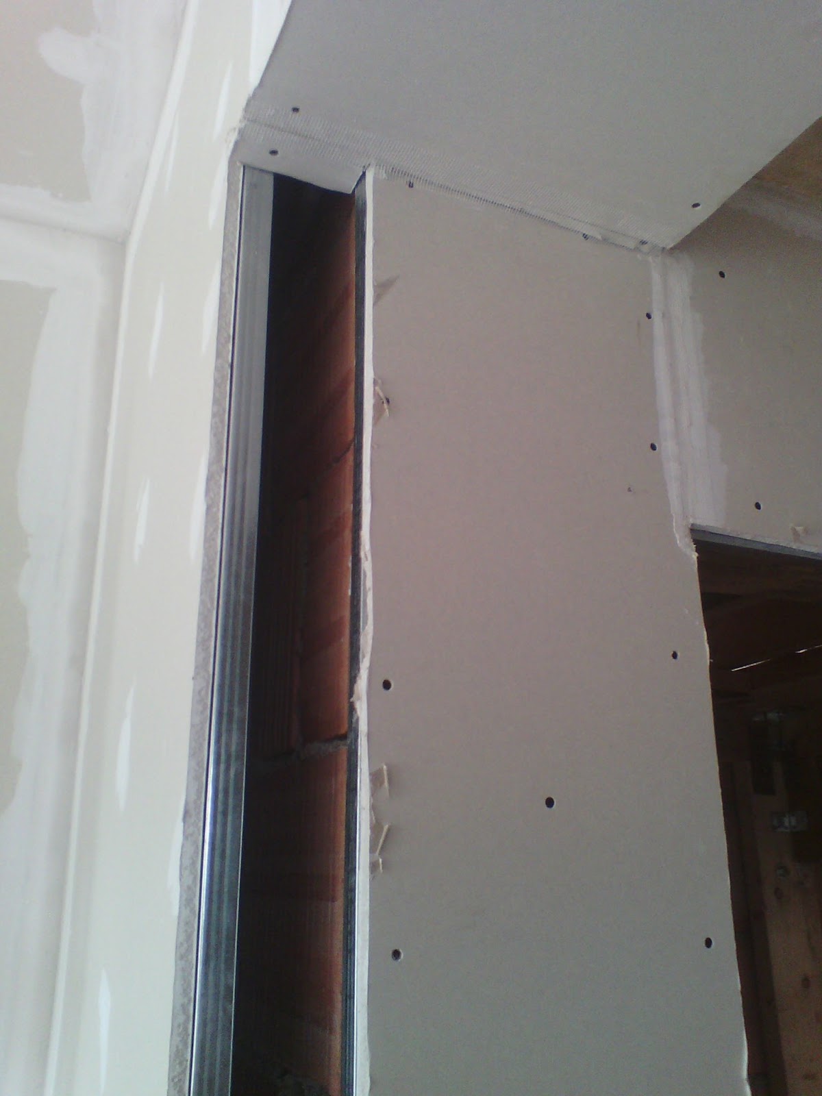 Arhiconstruct: Finisaje Interioare rigips Placare perete dressing si ...