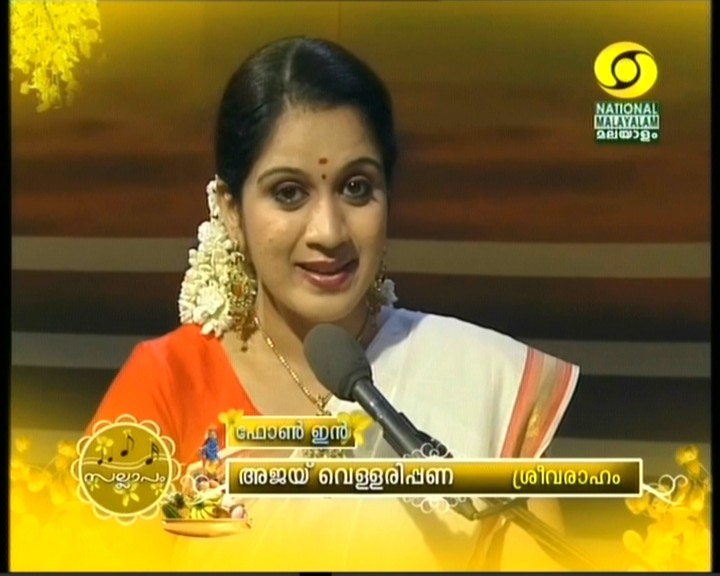 playback singer akhila anand in set saree cute images