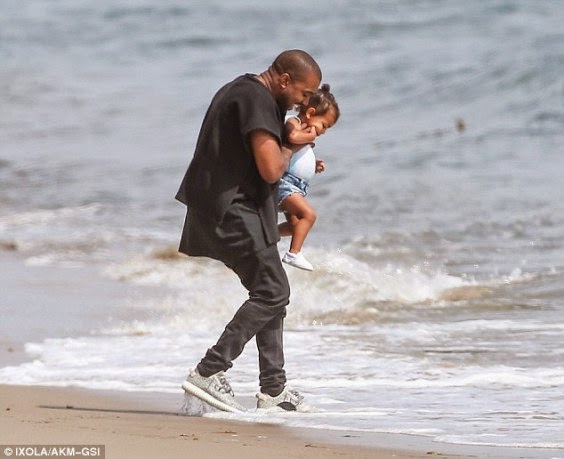 Photos: Kanye West and his daughter, North hit the beach..