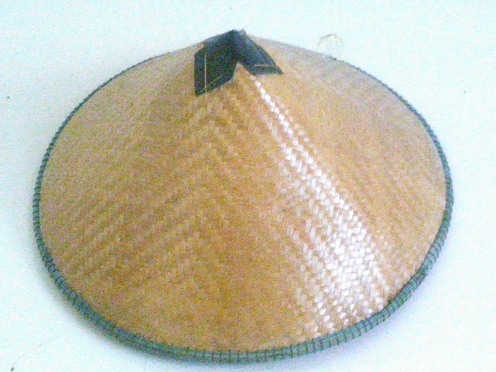 Caping, Pelindung Kepala Tradisional Para Petani