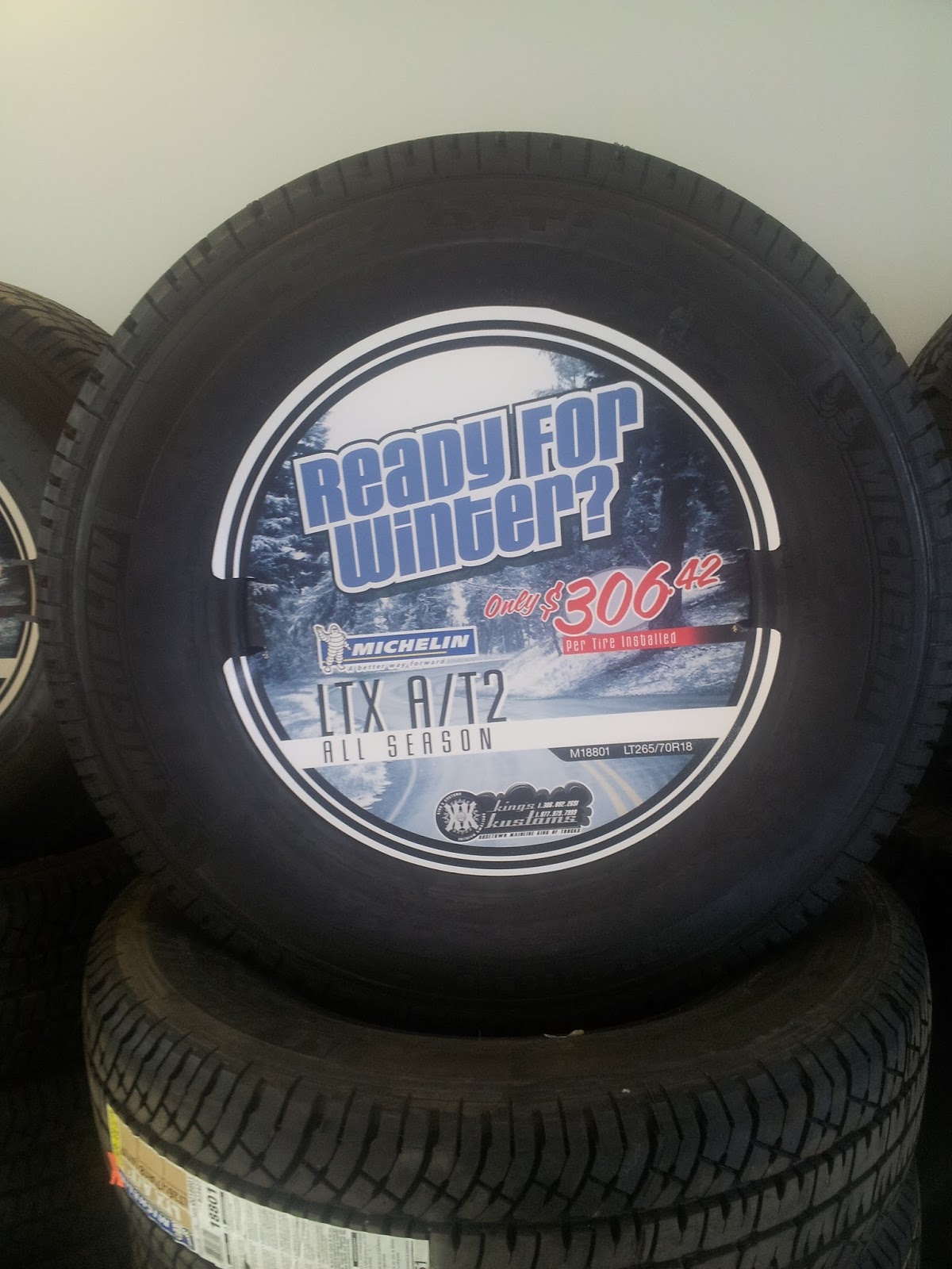 omecca custom graphic design: Winter Tire Display Signage