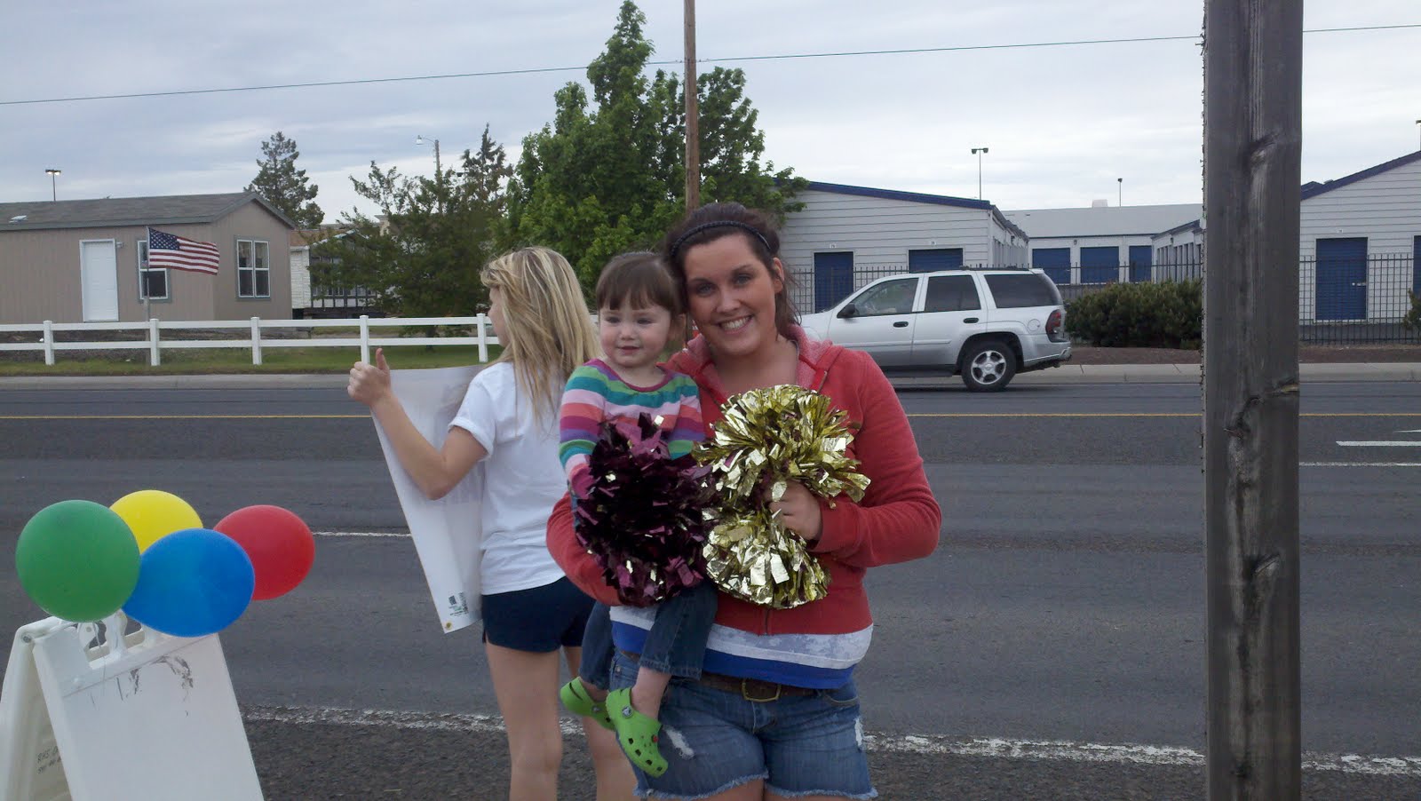 The Barnetts Helping The Cheerleaders At Their Car Wash
