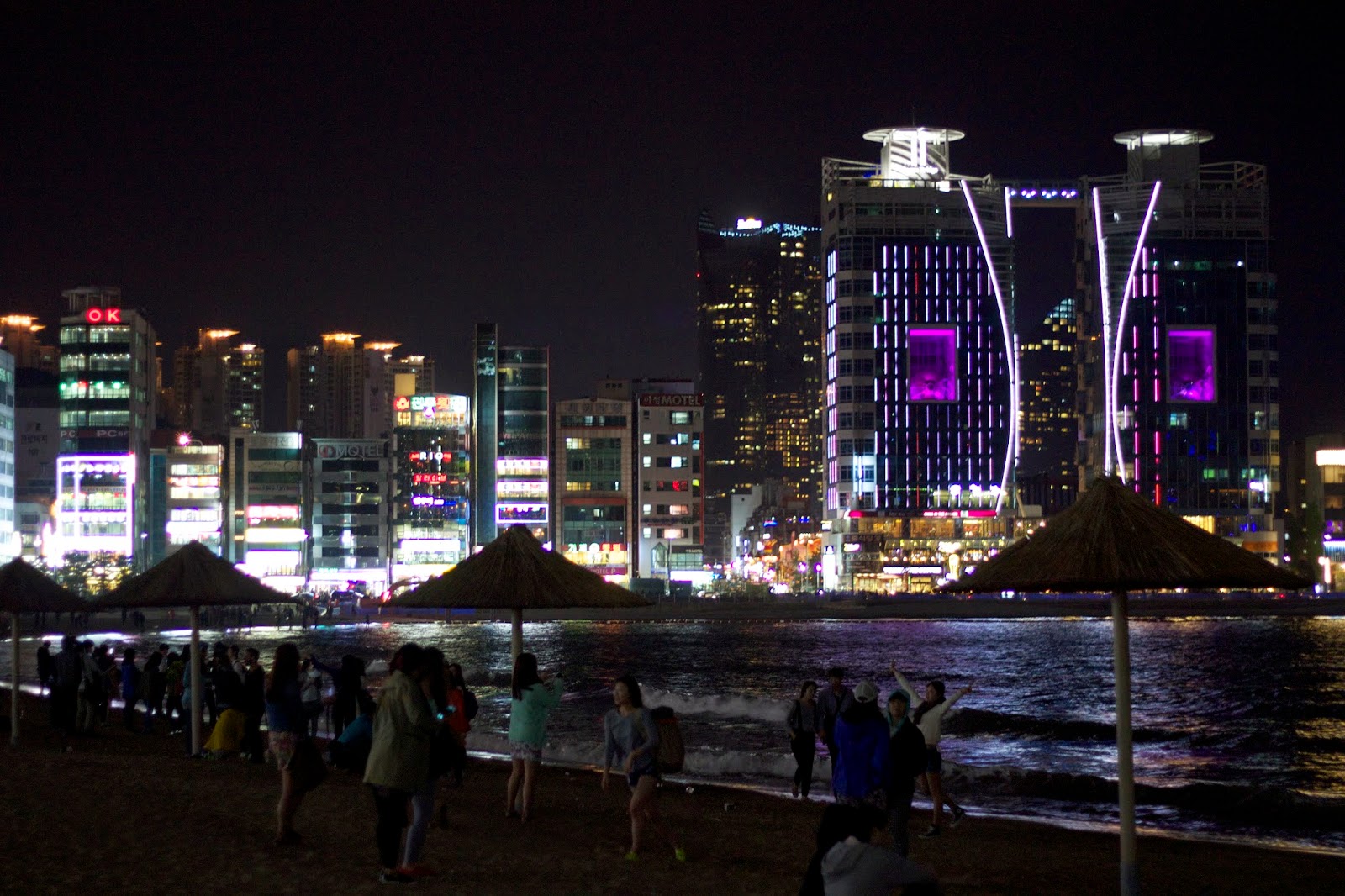 Through Glass and Prose: Busan Beaches at Night