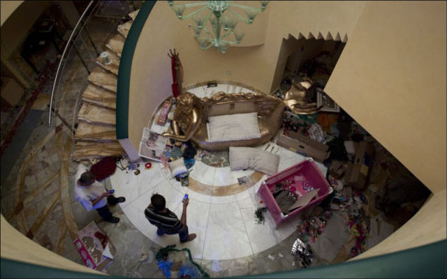 Libyan Rebels Inside Muammar Gaddafi House ~ Picture and Photos