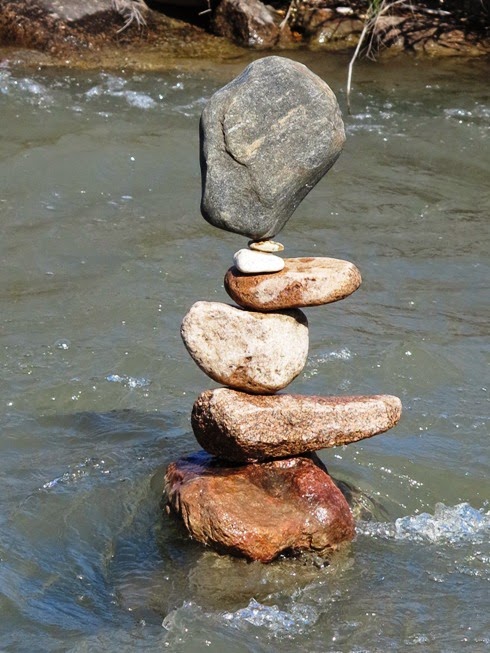 GOING ON ADVENTURES: Stacking stones at Llano's Earth Art Fest