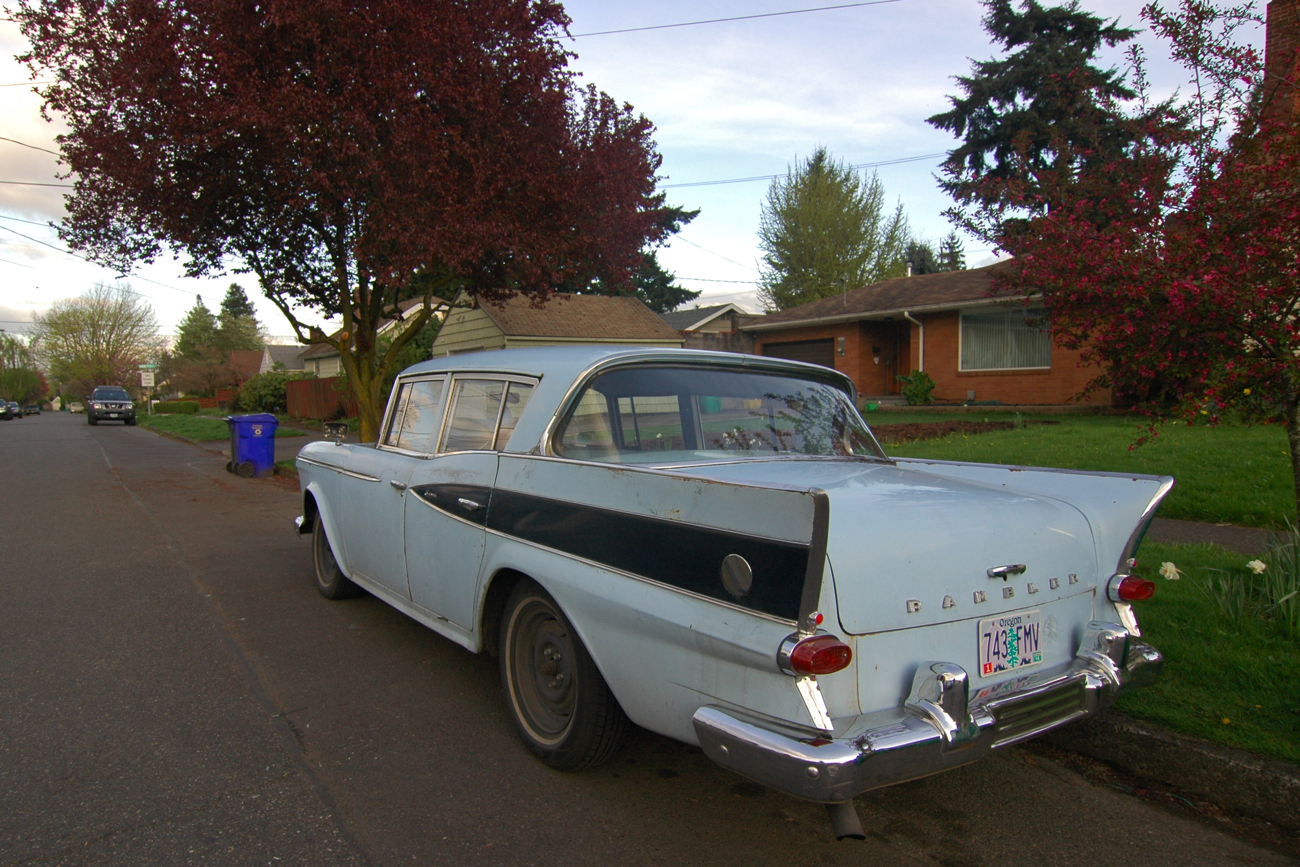 OLD PARKED CARS.: 1959 Rambler Six Super Sedan.
