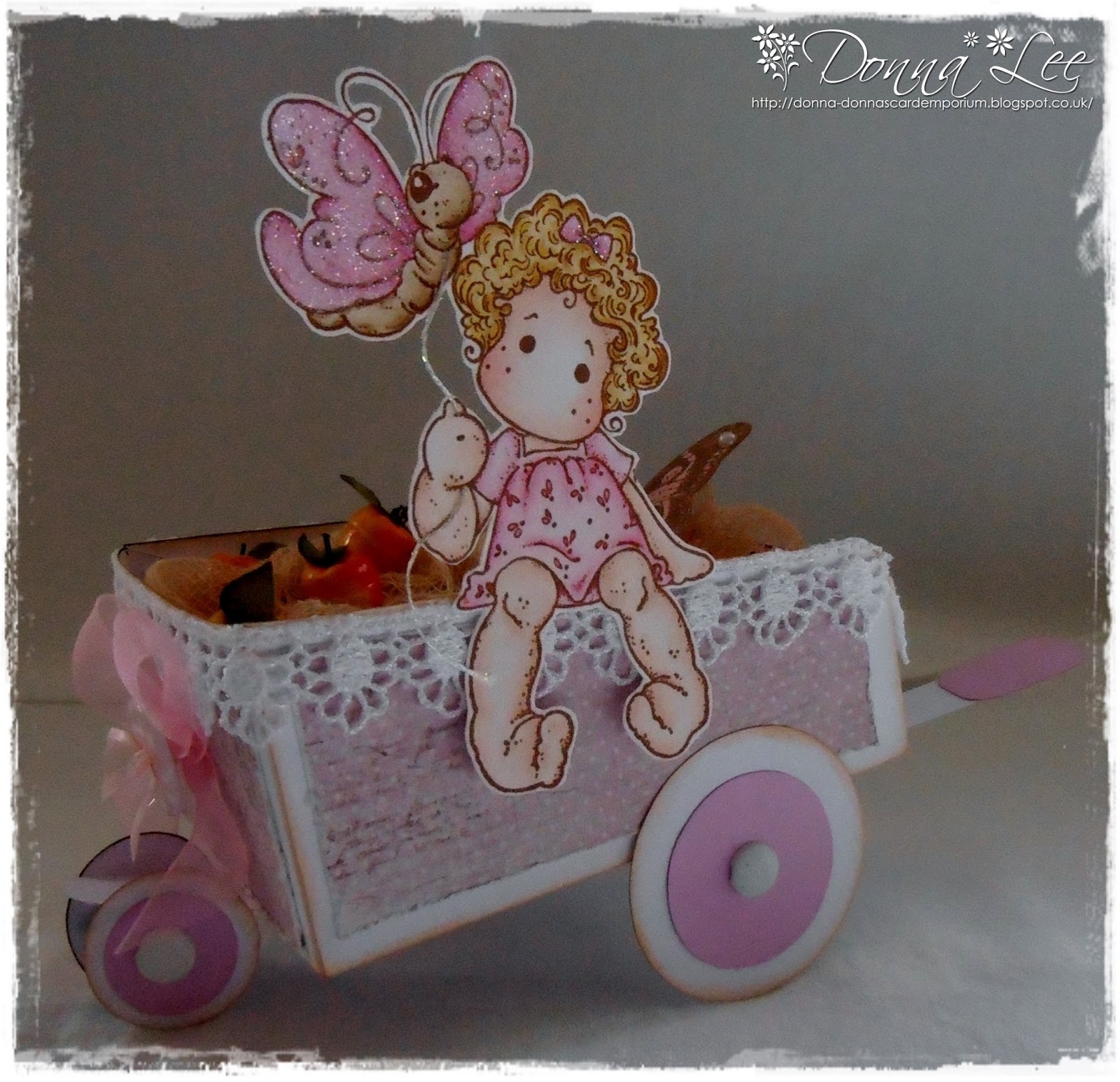 Donna's Card Emporium: A wheel barrow and Sitting Tilda With Butterfly.