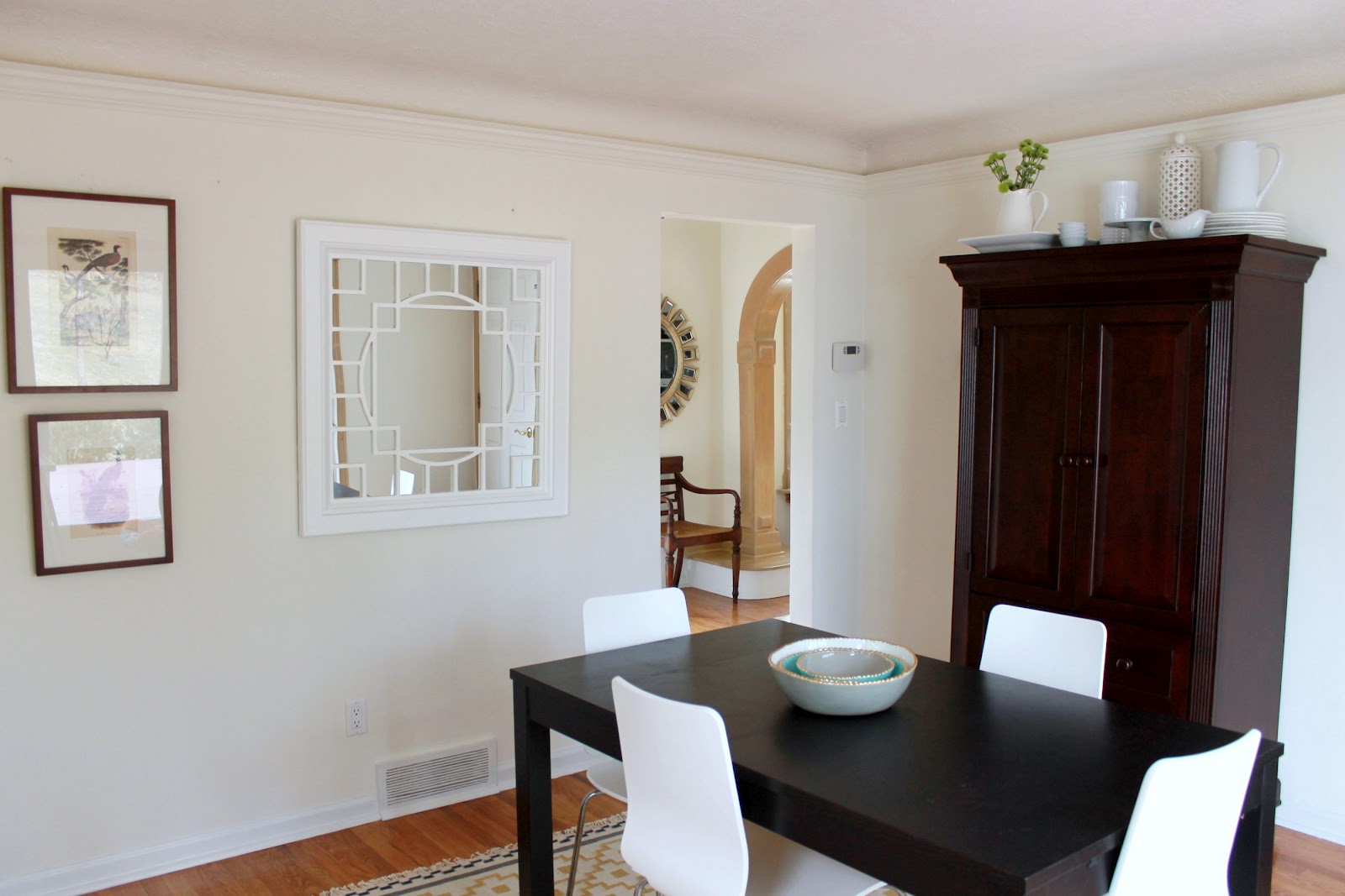 i love how the exposed brick fireplace is painted white along with the ...