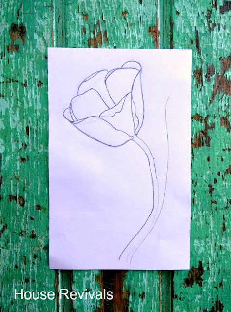 For your first leaf, draw a slightly curved line coming from the base ...