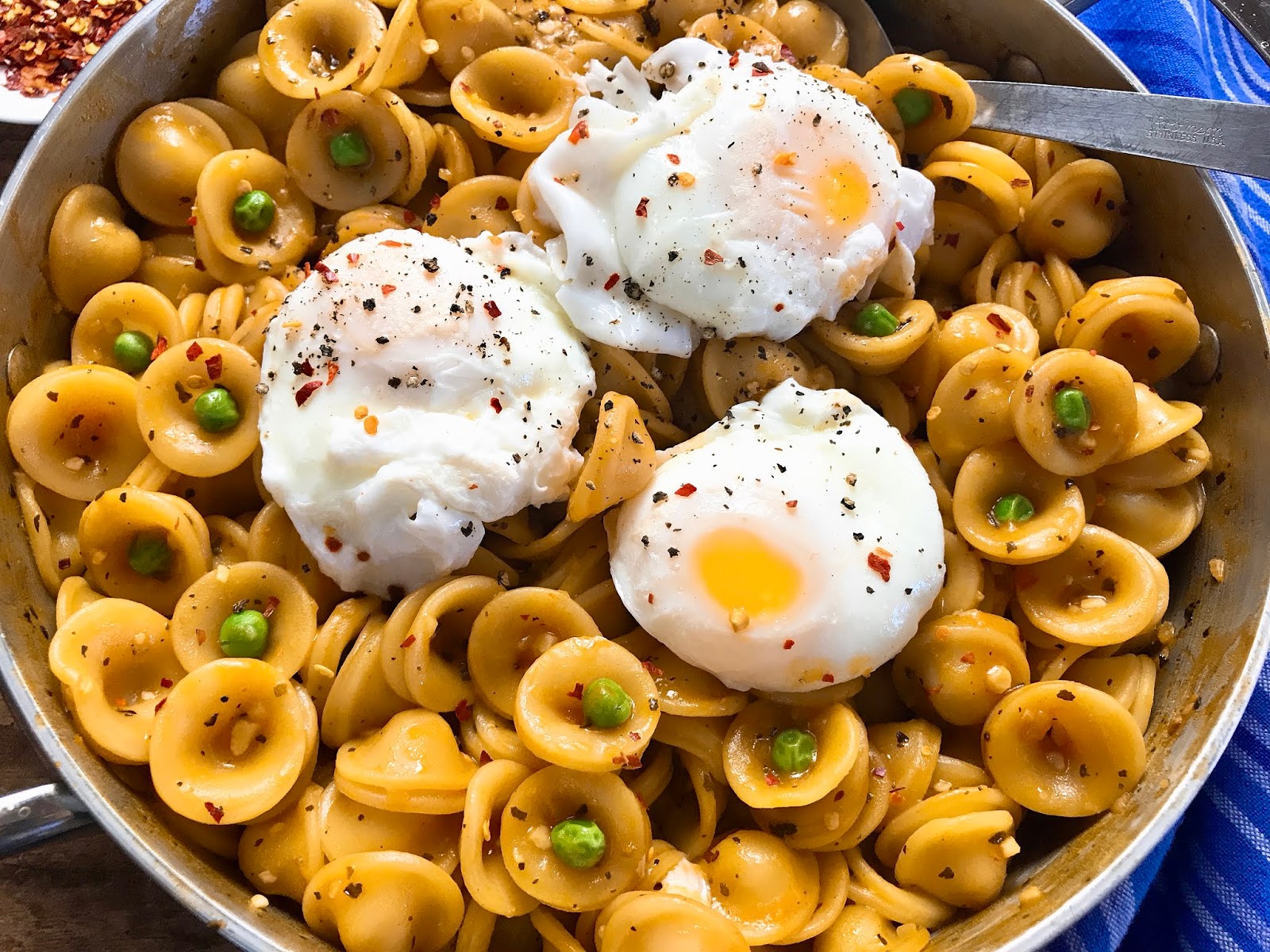 Orecchiette with Pea Pearls, Parmesan Rind and Poached Egg