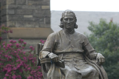 The City and the World: From John Carroll to "distilled Jesuitism."