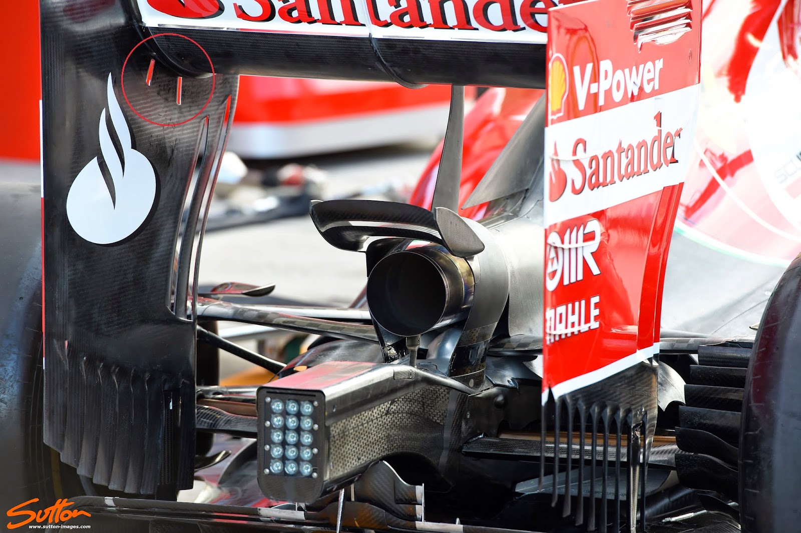 McLaren with a side plate of the new and innovative rear wing. 5 ...