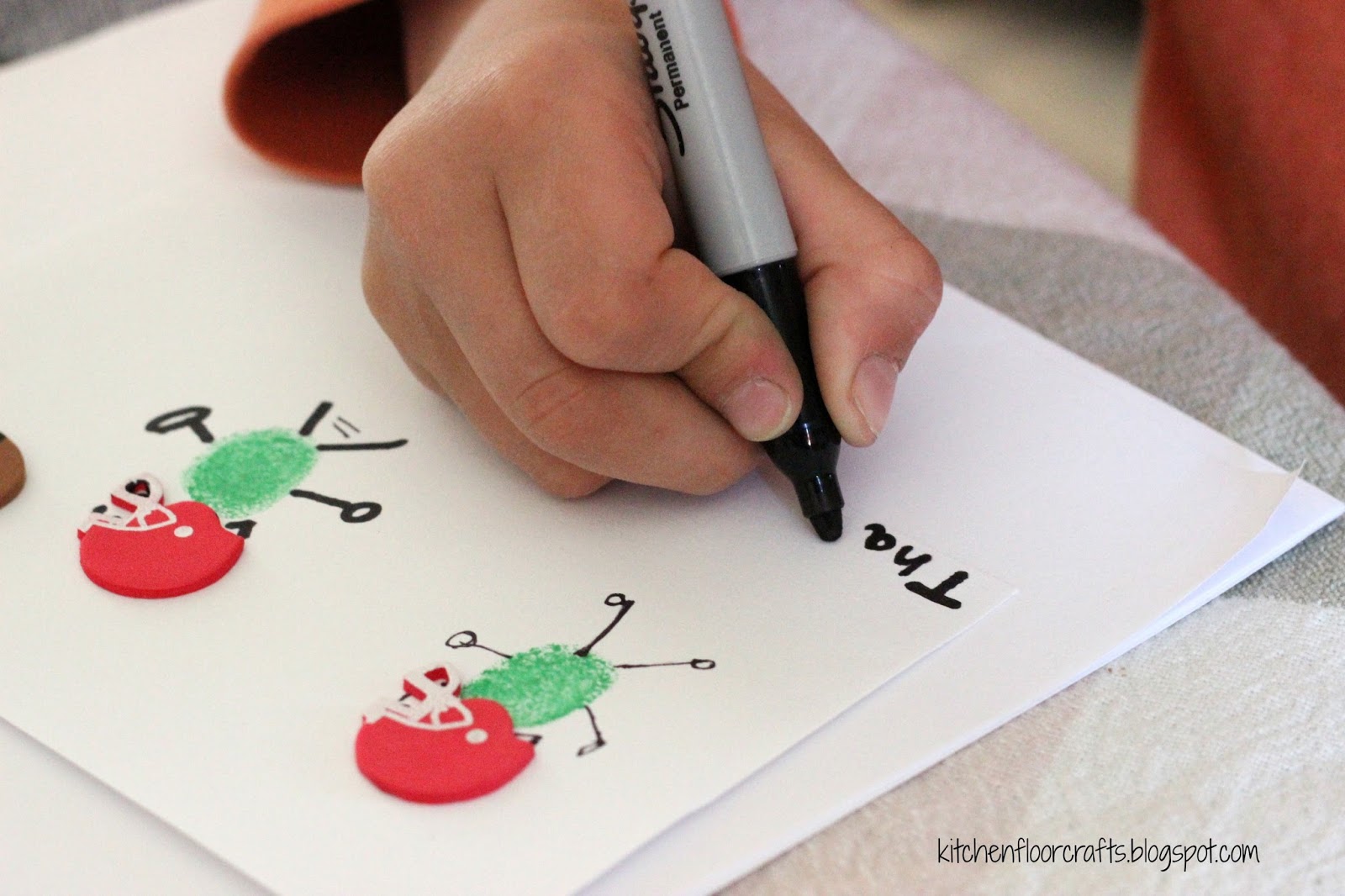 Kitchen Floor Crafts: Fingerprint Athletes