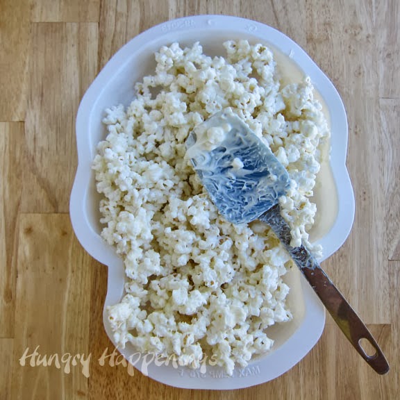 White Chocolate Popcorn Skull - Halloween Dessert - Hungry Happenings