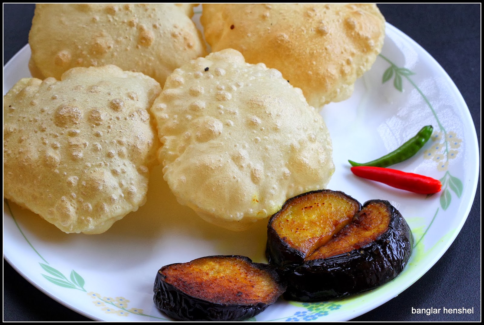 Banglar Henshel: Durga Shosthi Special Luchi, Chholar daal, Begun Bhaja ...