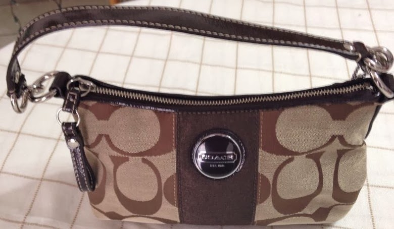 De Remante 35: Mini Bolsa Coach Café