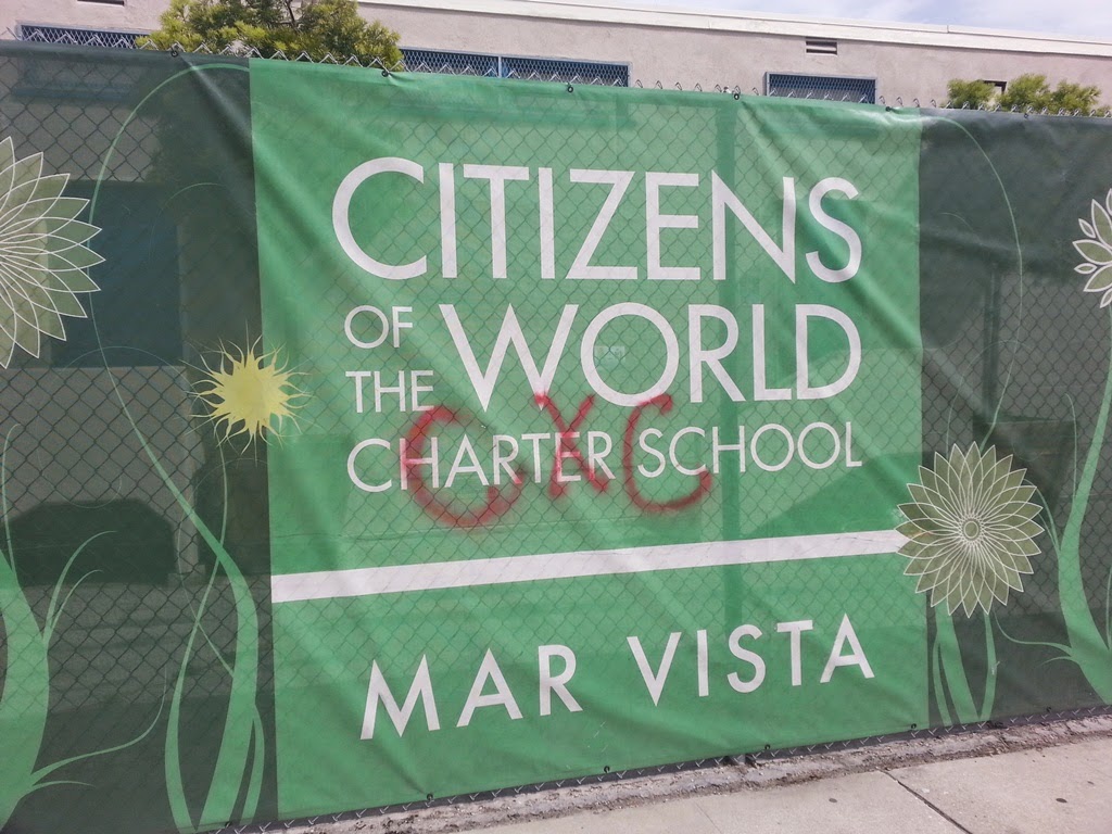 Adventures in Charter School Co-location: CWC fence covering removed