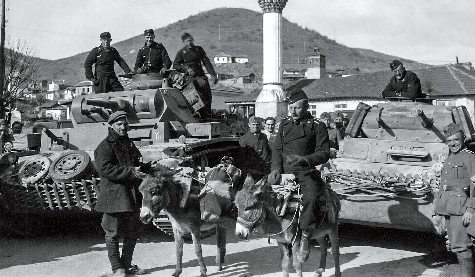 Panzermänner: Member of 9. Panzer-Division Playing with Donkey