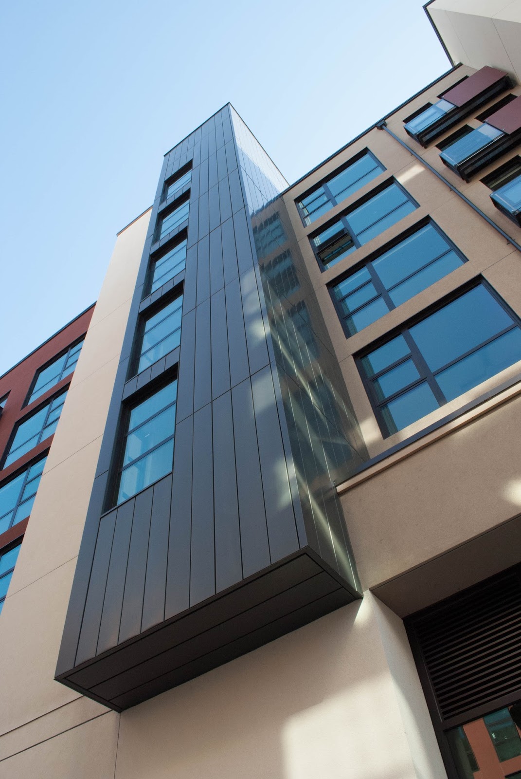 Folded Zinc Panels in One Henry Adams, A Multi-Family Residence in ...
