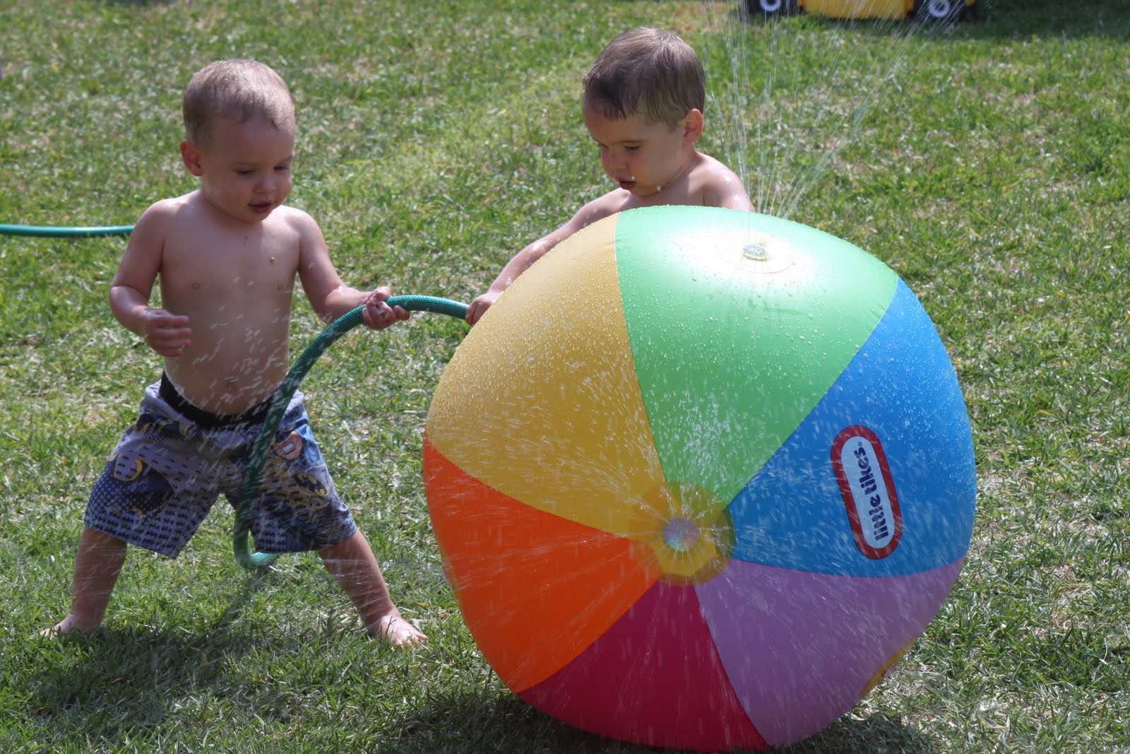The Peacock Family: Water Sprinkler Fun
