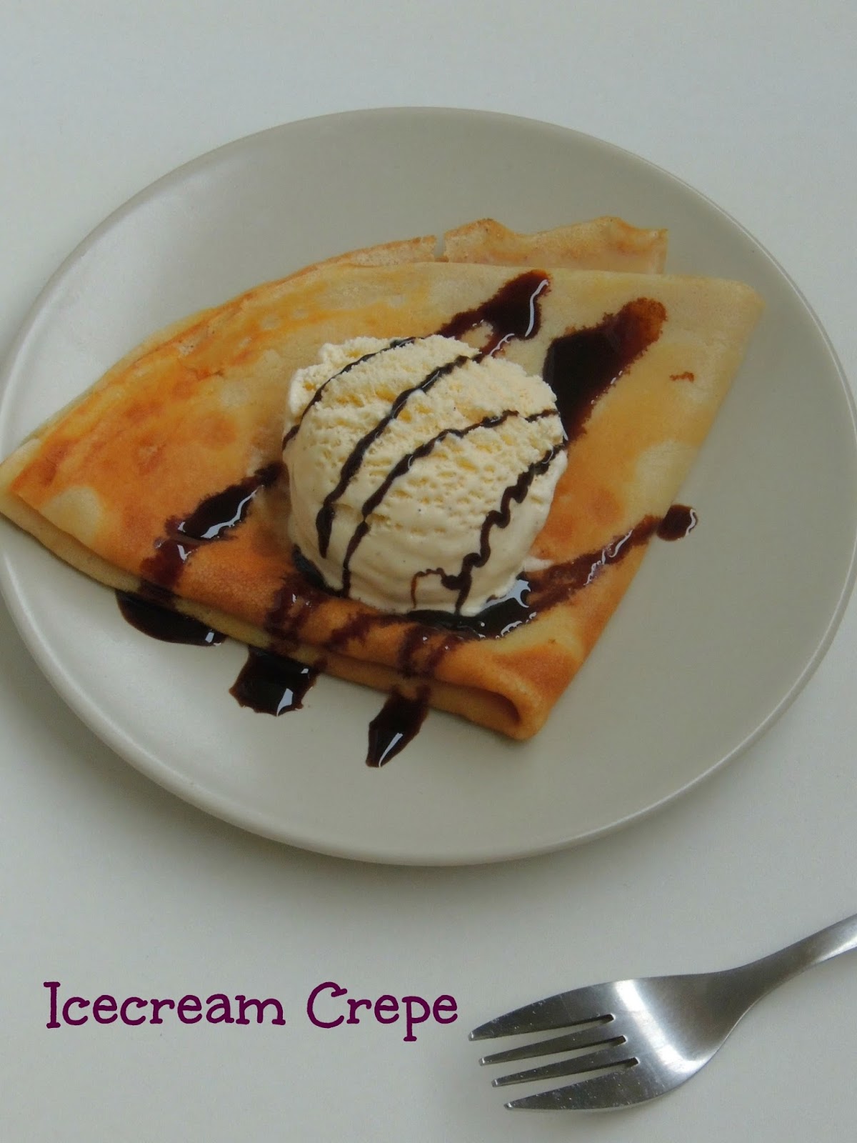 Priya's Versatile Recipes: Vanilla Icecream Crepe with Treacle Syrup