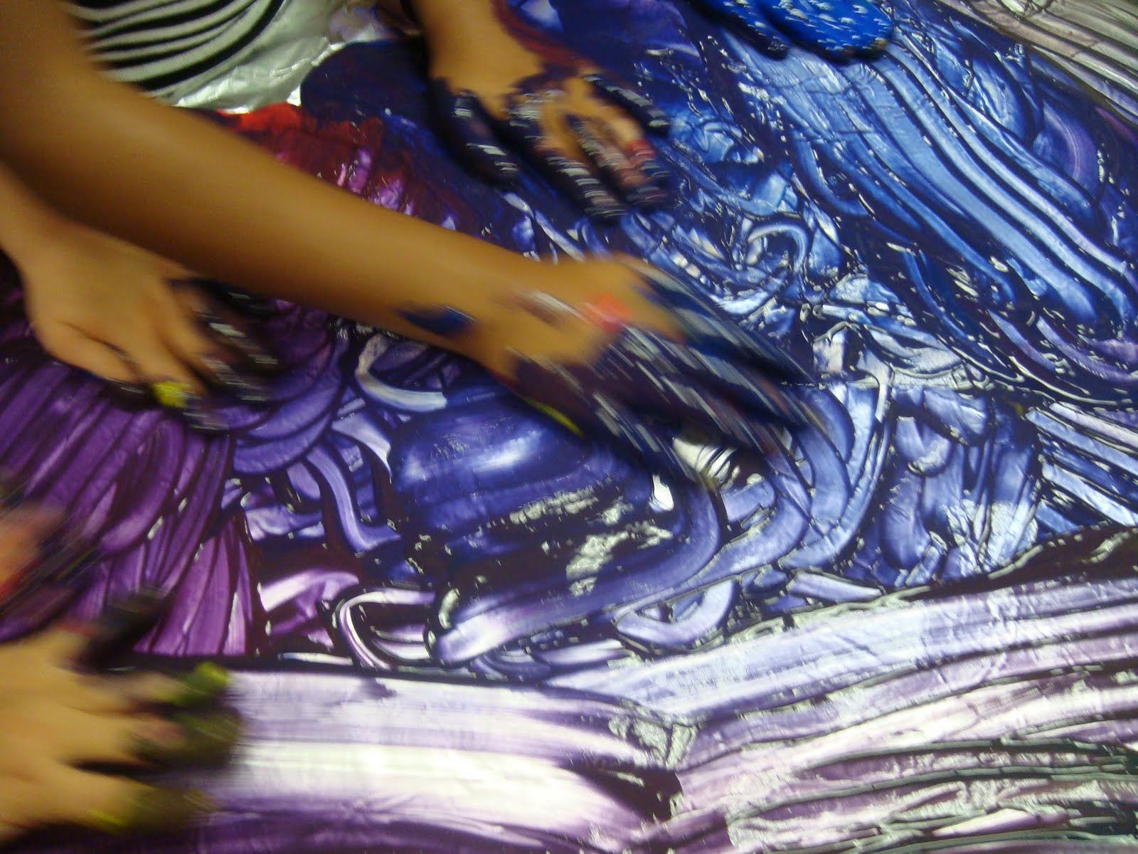 Joyful Learning in the Early Years: Finger Painting on Foil
