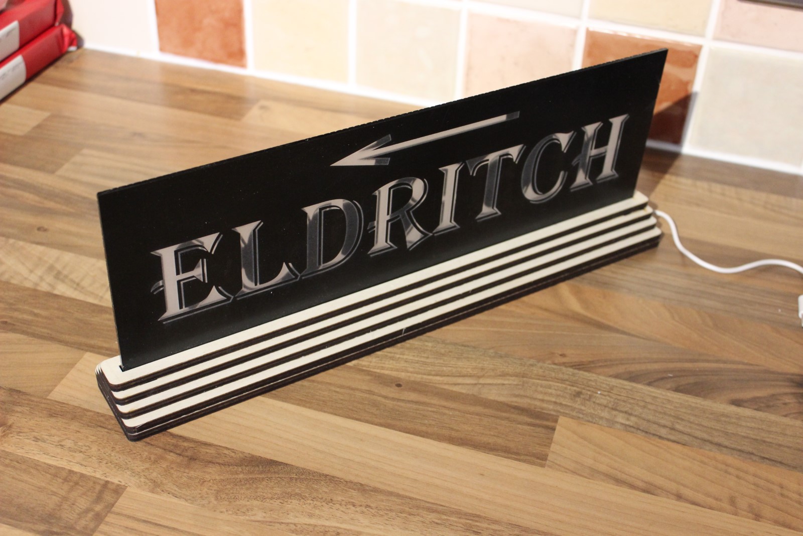 Double sided edge lit sign