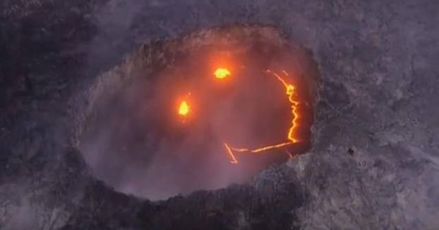 Strange smiling face inside crater of volcano in Hawaii (Video)