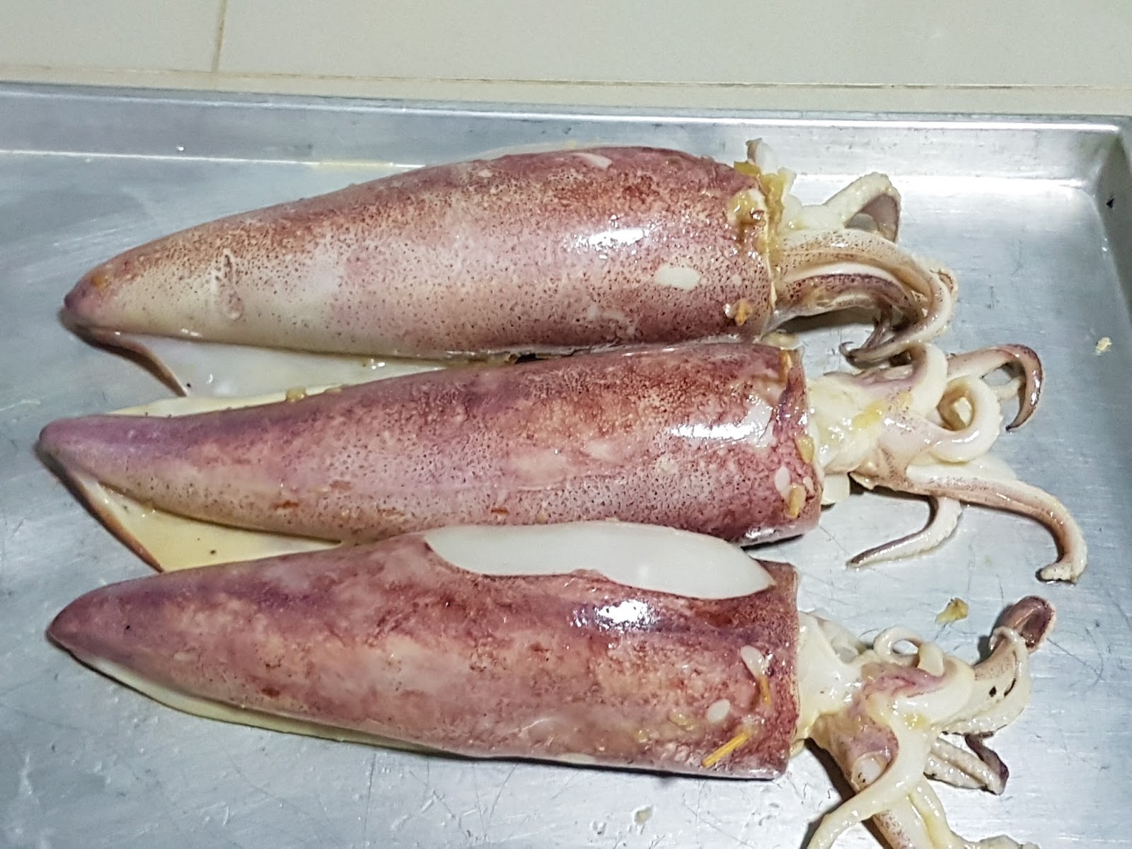 Rellenong Pusit (Stuffed Squid) in Tomato sauce