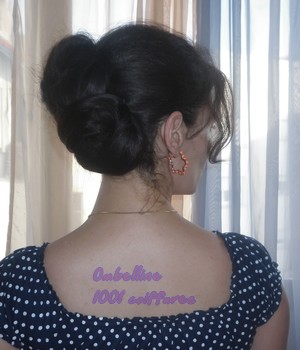 1001 coiffures: Chignon pin-up avec une pince banane