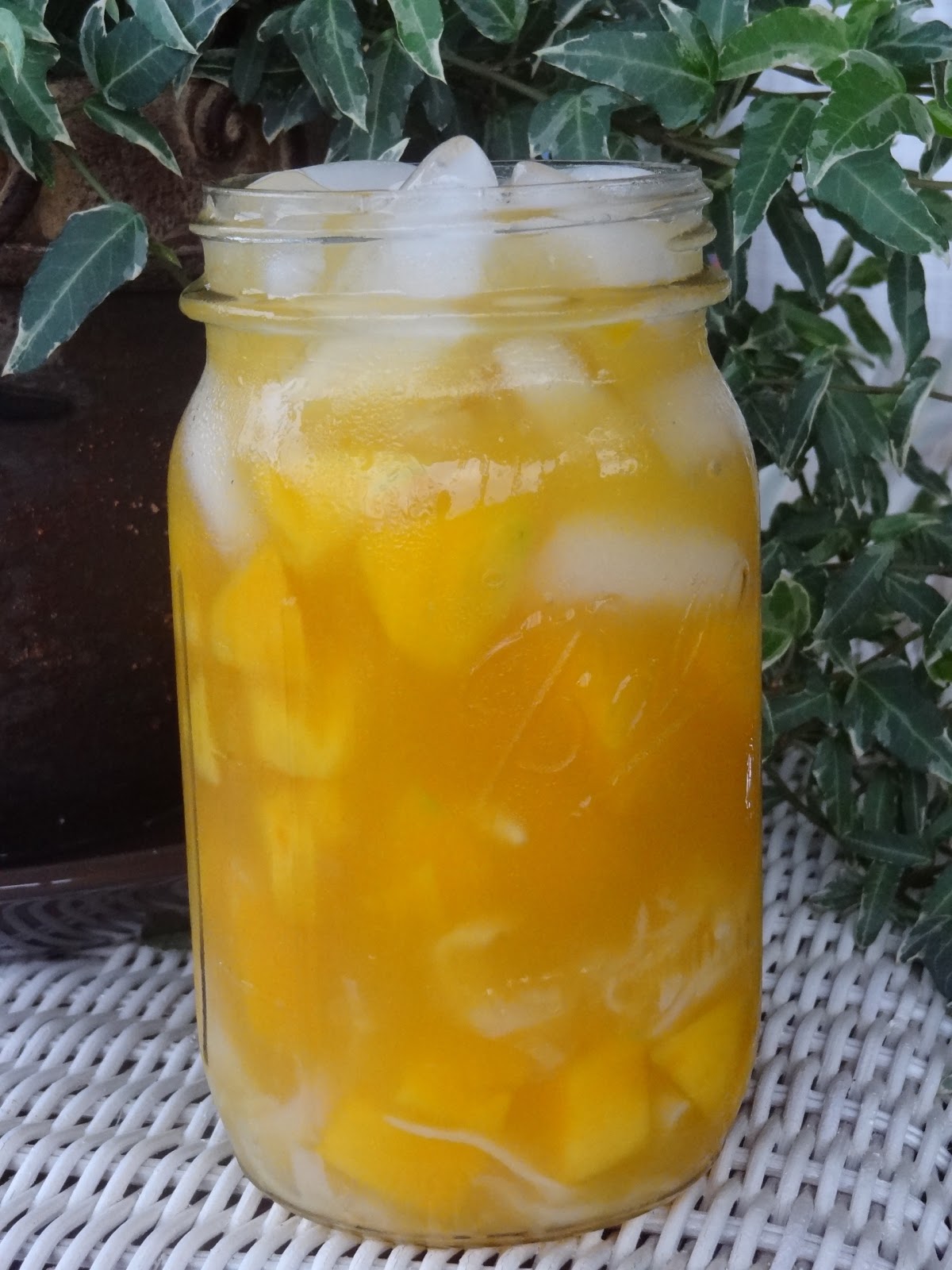 Mango and coconut strings in juice.