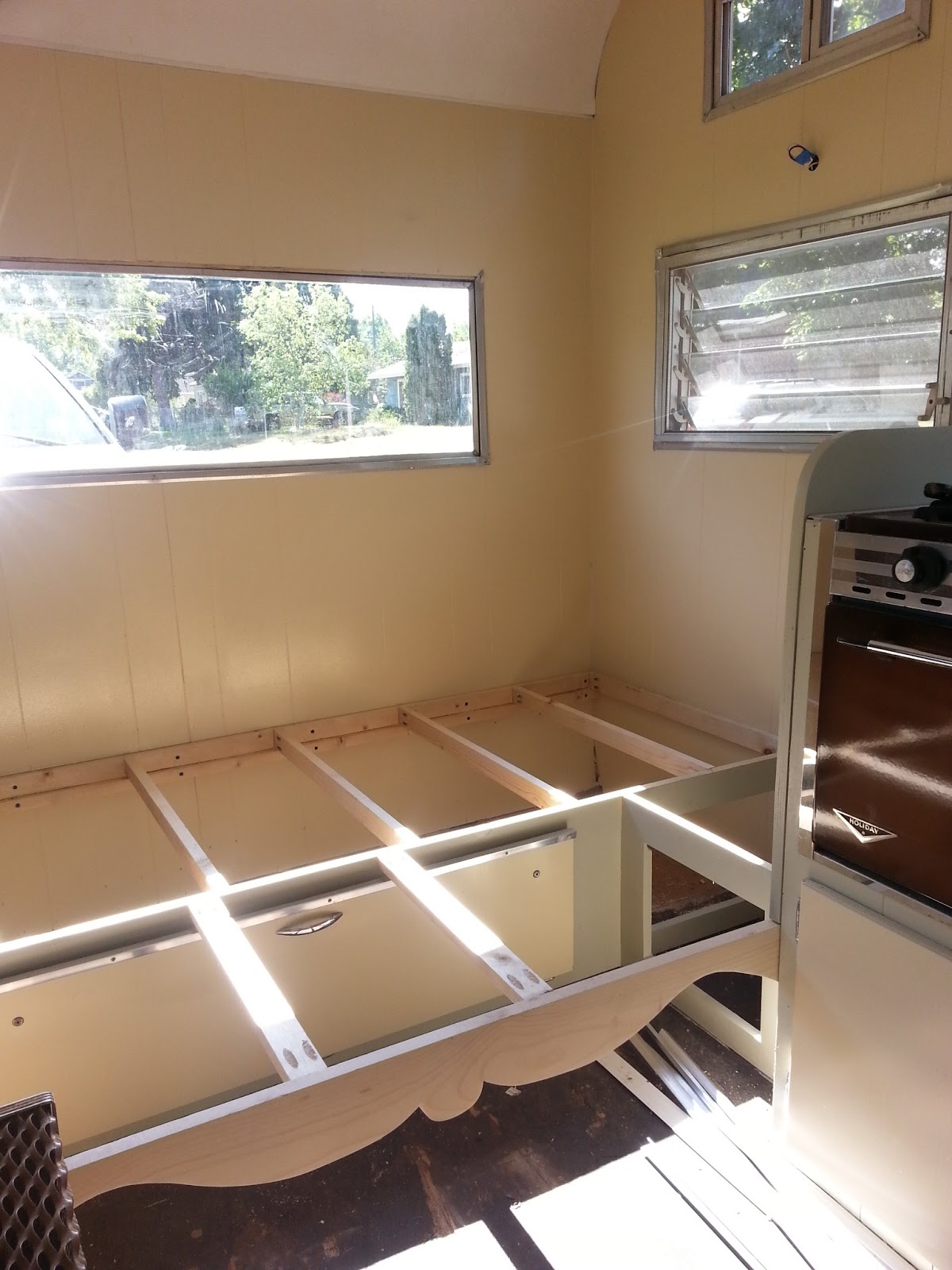 The Toaster Camper: More progress- bed and fridge